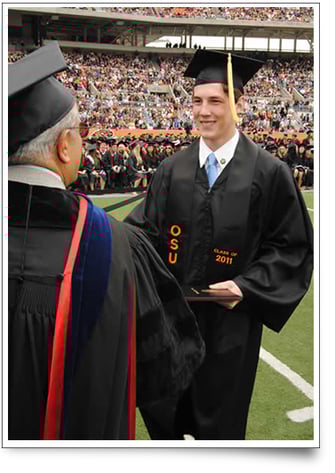 Why a handshake photographer's position really matters at commencement